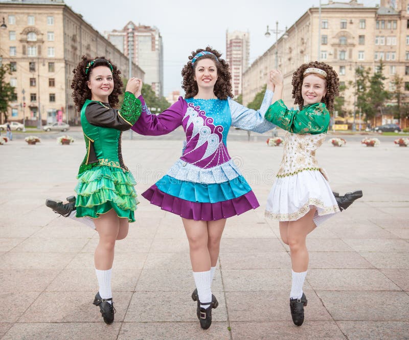 Three Women in Irish Dance Dresses and Wig Posing Stock Photo - Image ...
