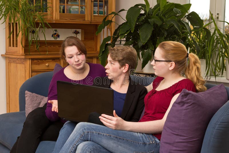 Three Women with Laptop Arguing Stock Image - Image of mother, green ...