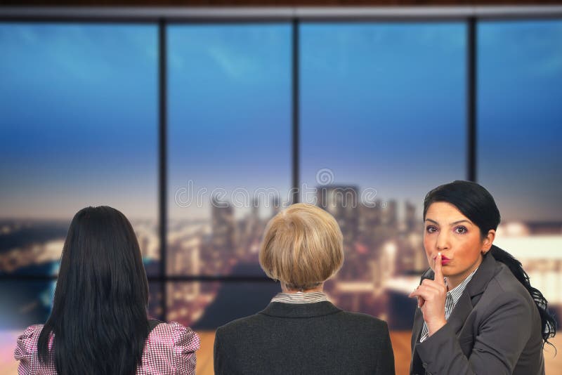 Three Women in the Office, One Showing the Silence Sign Stock Image ... Three Women in the Office, One Showing the Silence Sign Stock Image ...