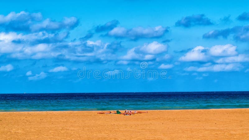 Three Women are Sunbathing on the Beach Stock Image - Image of summer ...