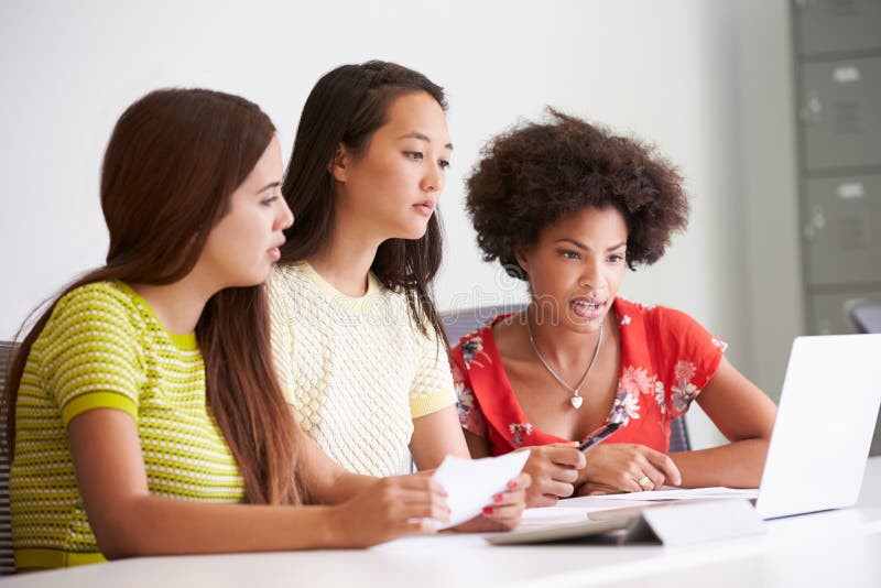 Three Women Working Together in Design Studio Stock Photo - Image of ...