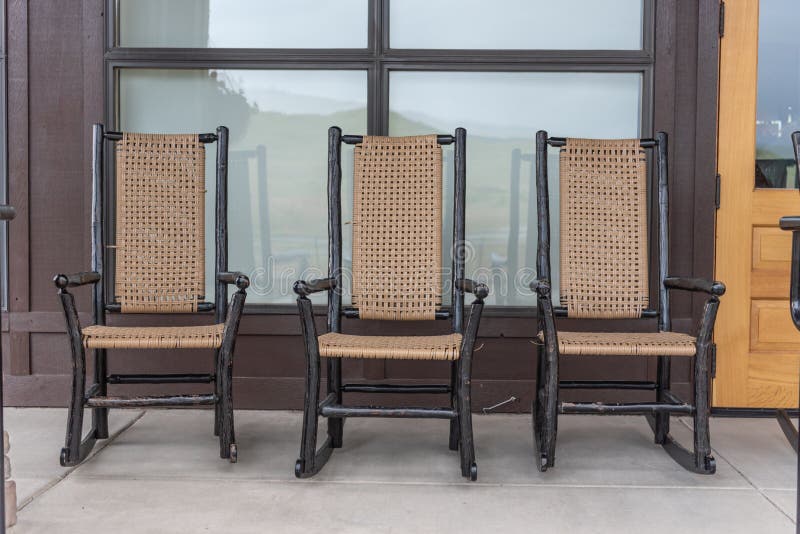 Three Wood and Wicker Rocking Chairs Stock Image - Image of relaxation ...