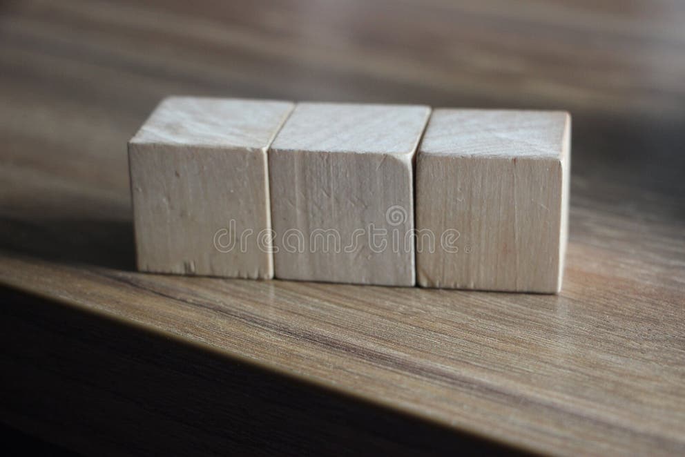 Three Wooden Blocks Front View, on Wooden Table Border. Education ...