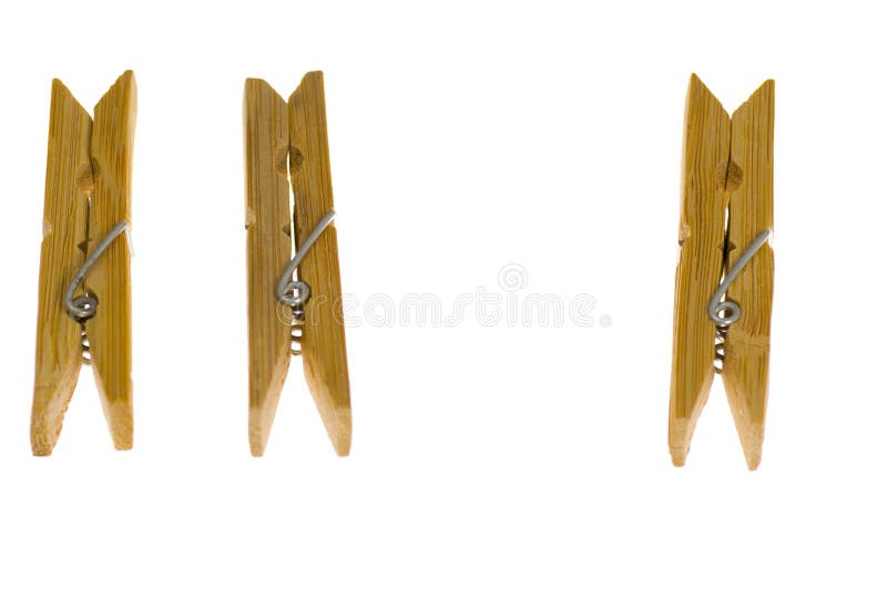 Three wooden clothes-pegs stock image. Image of klammer - 3040711