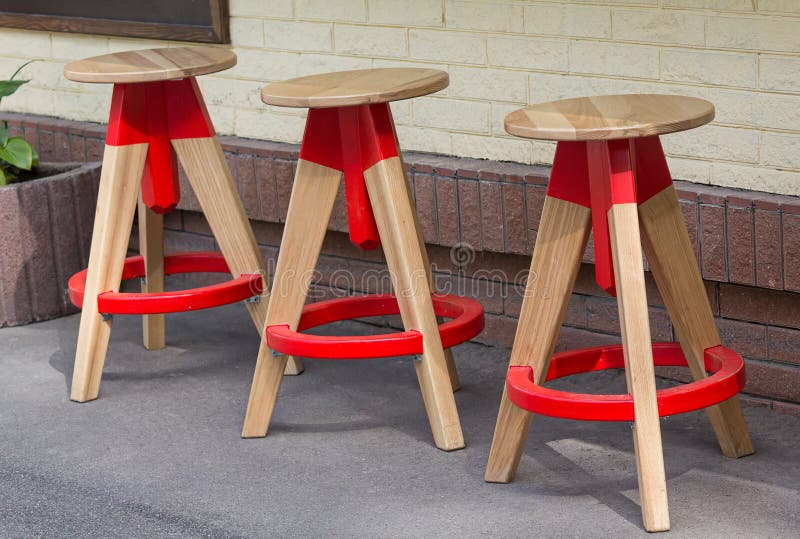 Three Wooden Stool in a Modern Style Street Cafe Stock Image - Image of ...