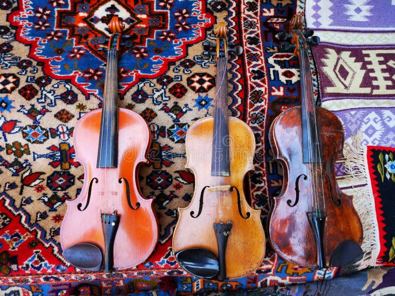 Three Wooden Violins of Different Colors Stock Photo - Image of ...