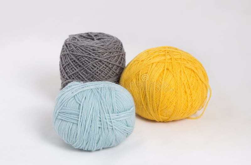 Three Wool Balls and Knitting Needles Stock Image - Image of woven ...
