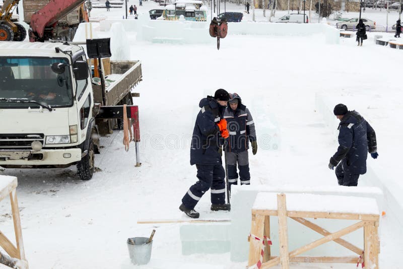 Three Workers on the Installation of Ice Blocks for the Ice Town Stock ...