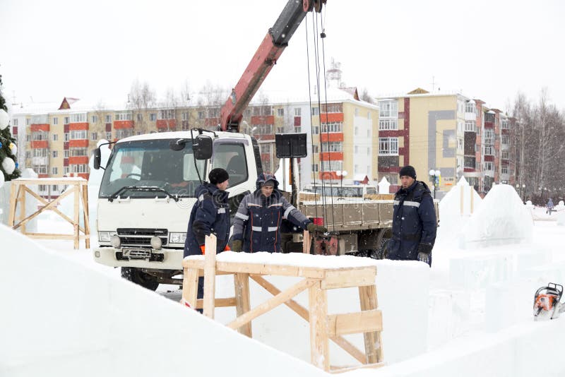 Three Workers on the Installation of Ice Blocks for the Ice Town Stock ...