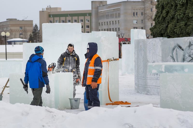 Three Workers Talking on the Construction Site Stock Image - Image of ...