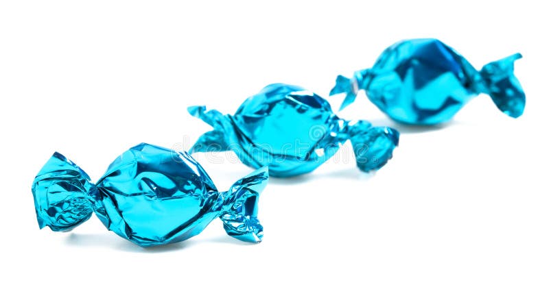 Three Wrapped Blue Candy on a White Background Stock Image - Image of ...