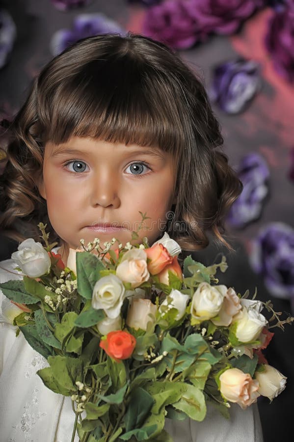 Girl with a Bouquet of Roses Stock Photo - Image of concepts, dress ...