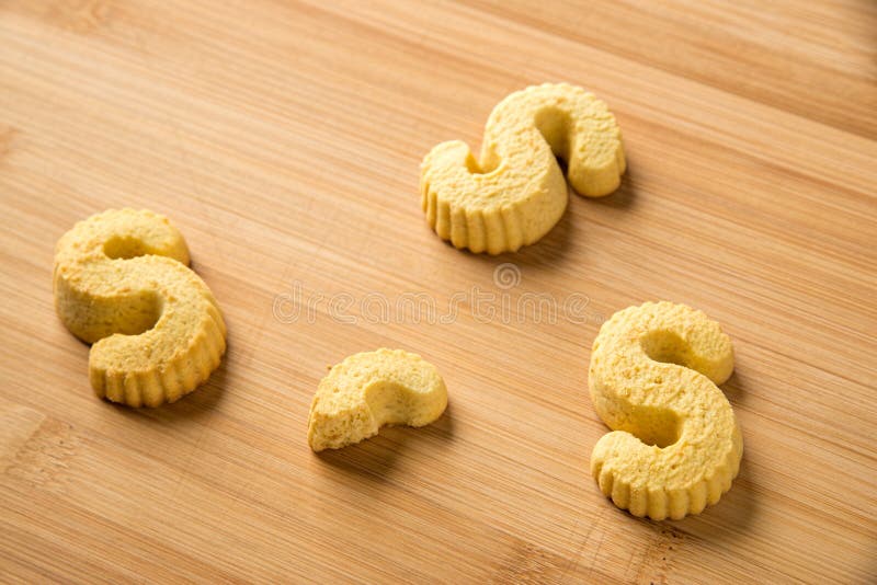 Three yellow biscuits stock photo. Image of shortbread - 89533920