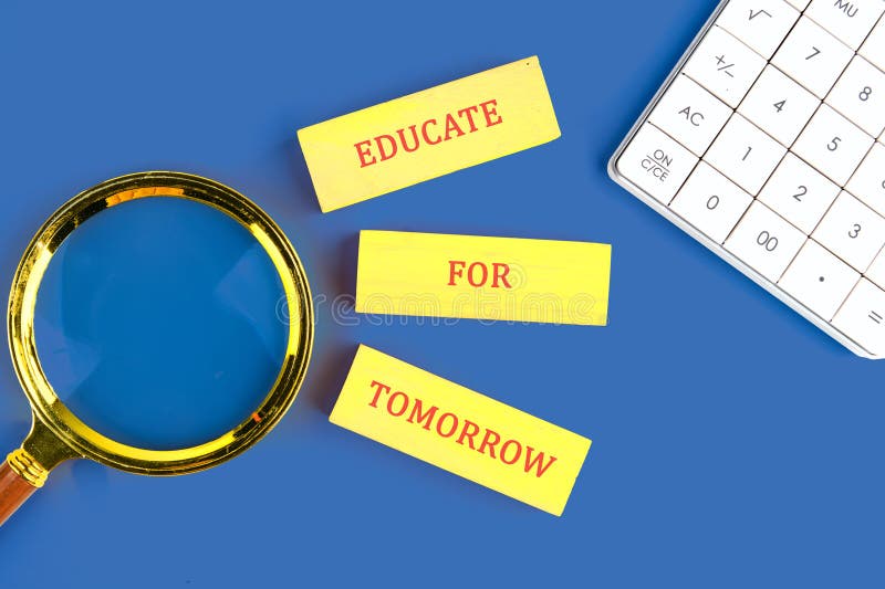 Three Yellow Blocks Say Educate for Tomorrow, Showcasing a Calculator ...