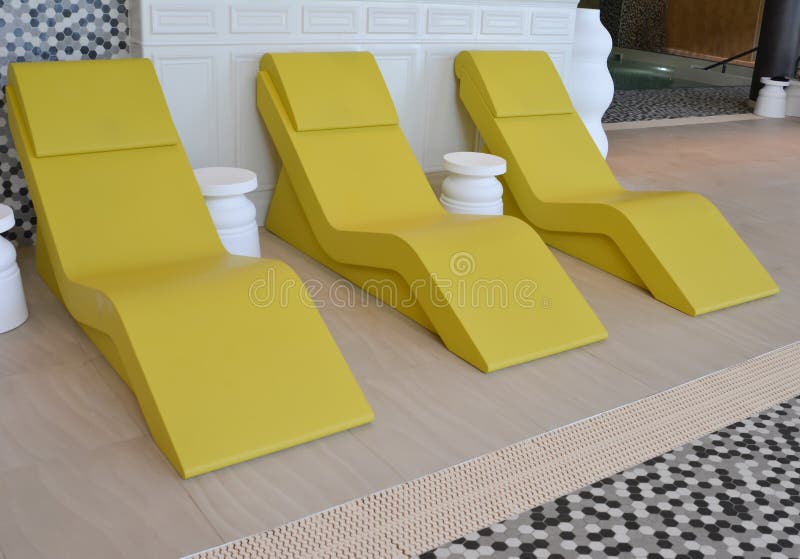 Three Yellow Chaise Longue in the Pool Stock Photo - Image of outdoors ...