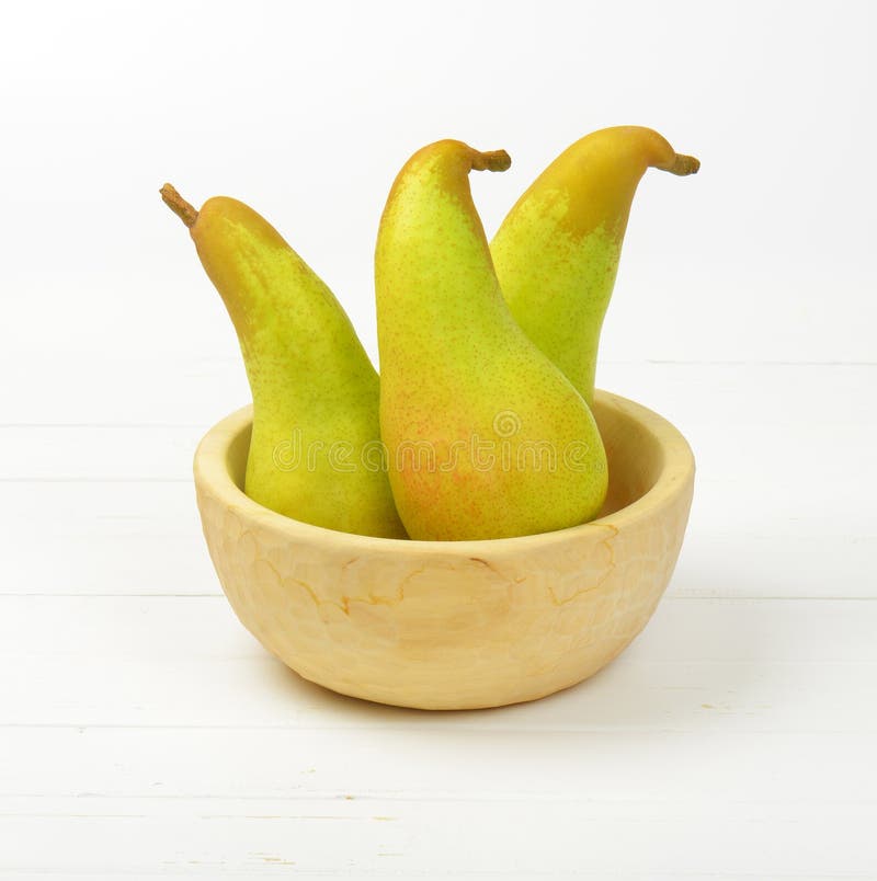 Three yellow pears stock photo. Image of luscious, sweet - 93315750