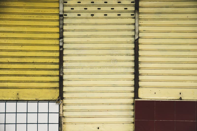 Three Yellow and Red Doors with White Trim Stock Photo - Image of ...