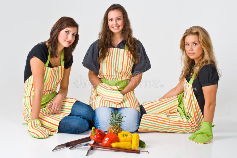 Three girls cooking stock image. Image of pose, happy - 4931323