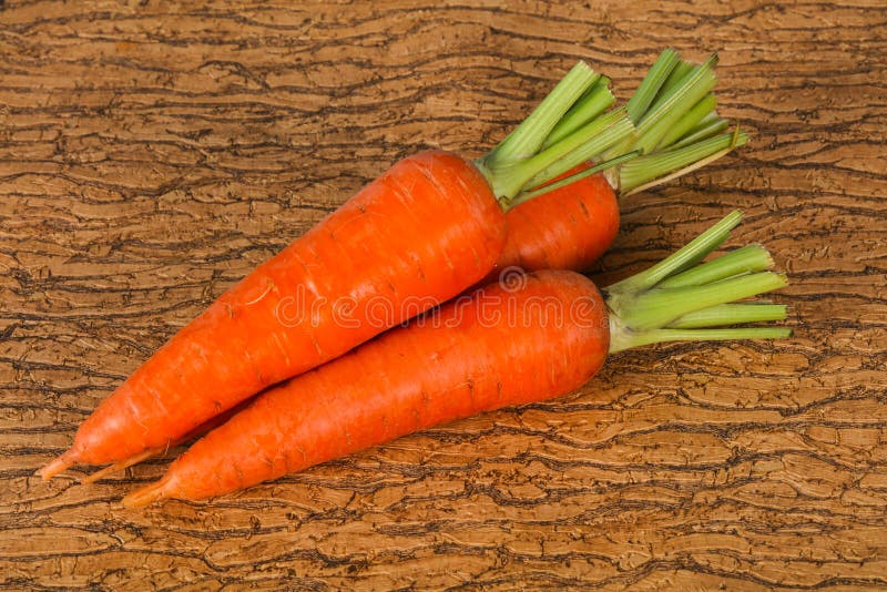 Three Young Fresh Ripe Carrot Stock Photo - Image of white, orange ...