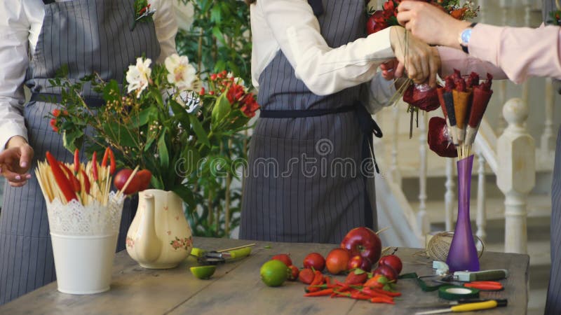 Three Young Handsome Chef Florists Work at Flowers Fruit Shop Making ...