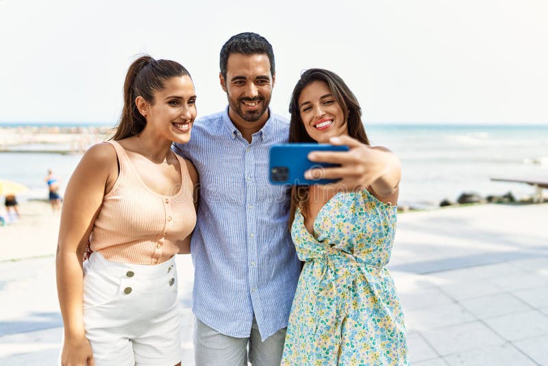 Three Young Hispanic Friends Smiling Happy Make Selfie by the ...