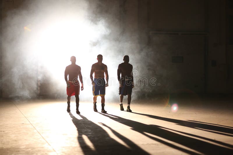 Three Young Men Boxing Workout in an Old Building Stock Image - Image ...