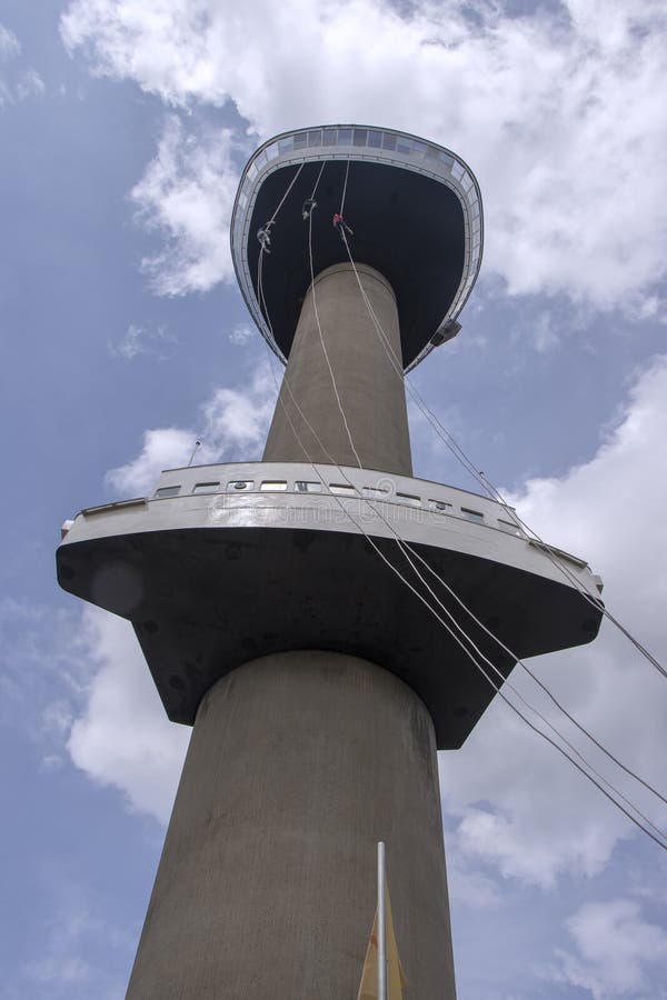 Three Young People Abseiling Down the Euromast Tower in Rotterdam Stock ...