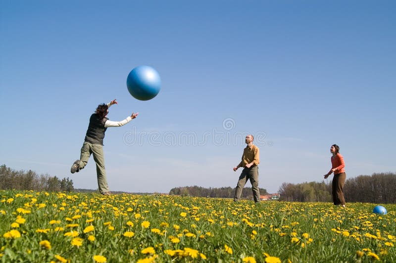 Three Young People with Ball Stock Image - Image of girl, balls: 2420733