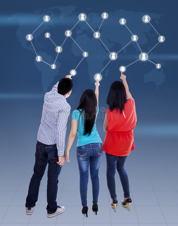 Three Young People Pressing a Touchscreen Stock Image - Image of group ...