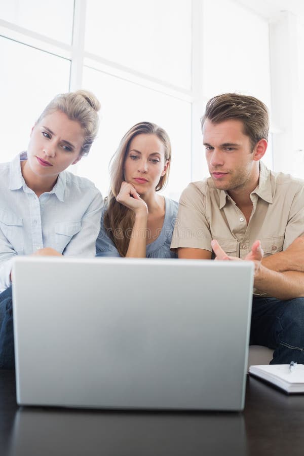 Three Young People Working on Computer Stock Image - Image of people ...