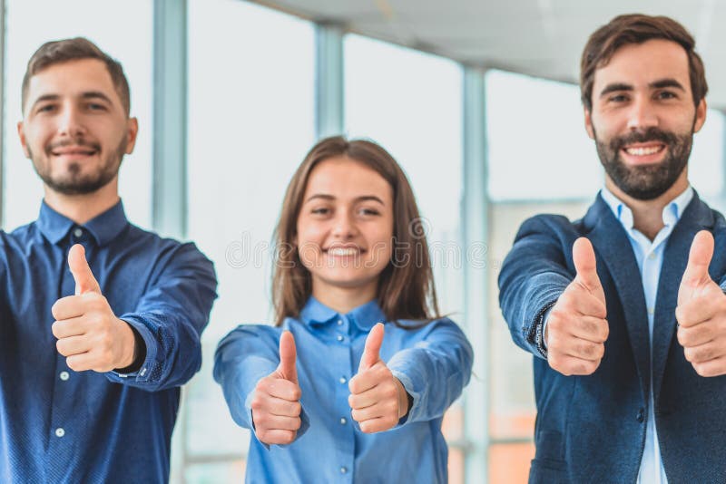 Three Young Serious Partners in the Office. during this, they are ...