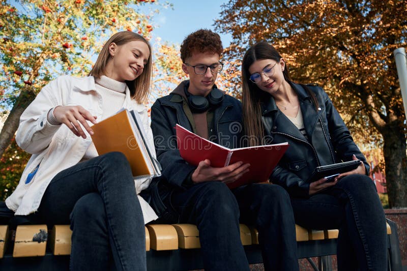 Three Young Students are Outside the University Outdoors Stock Image ...
