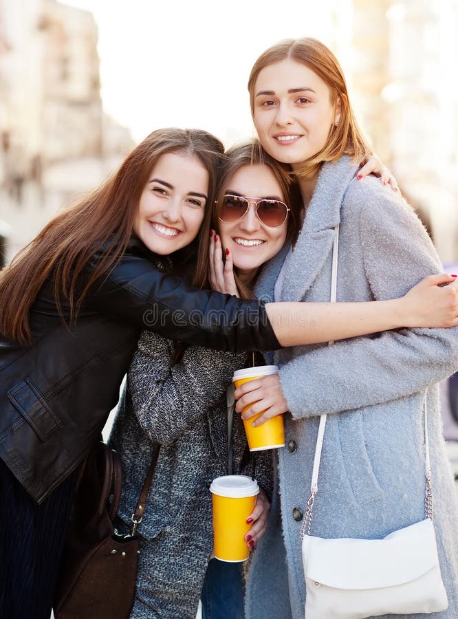 Three Young Women, Best Friends Smiling at the Camera Stock Photo ...