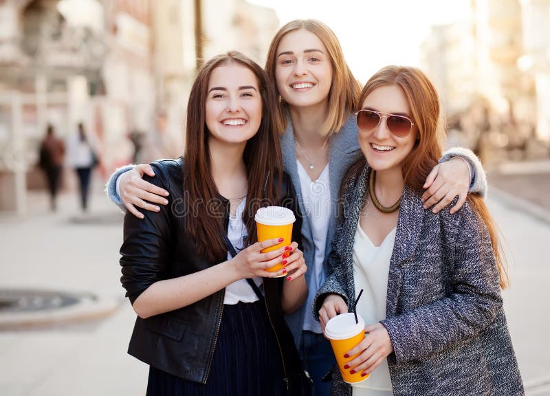 Three Young Women, Best Friends Smiling at the Camera Stock Image ...