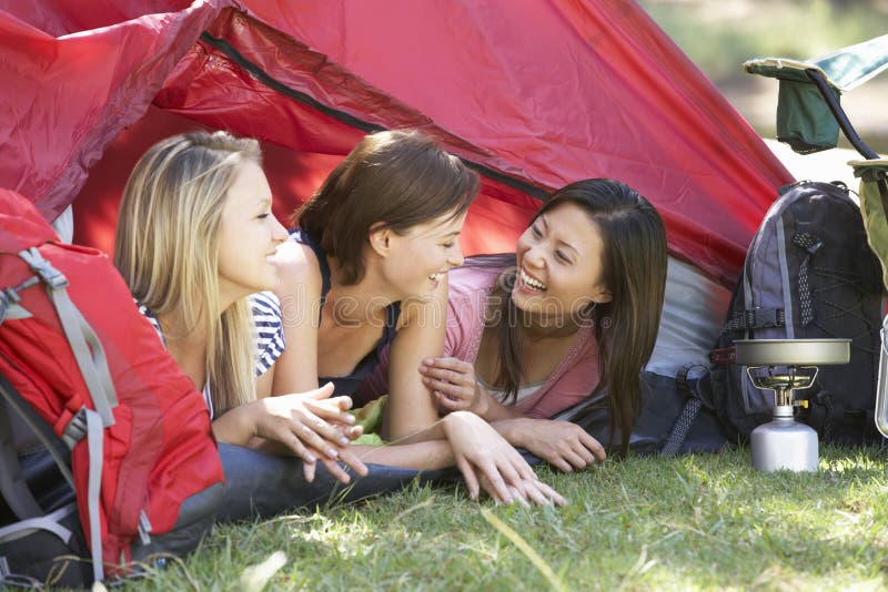 Three Young Women on Camping Holiday Together Stock Photo - Image of ...