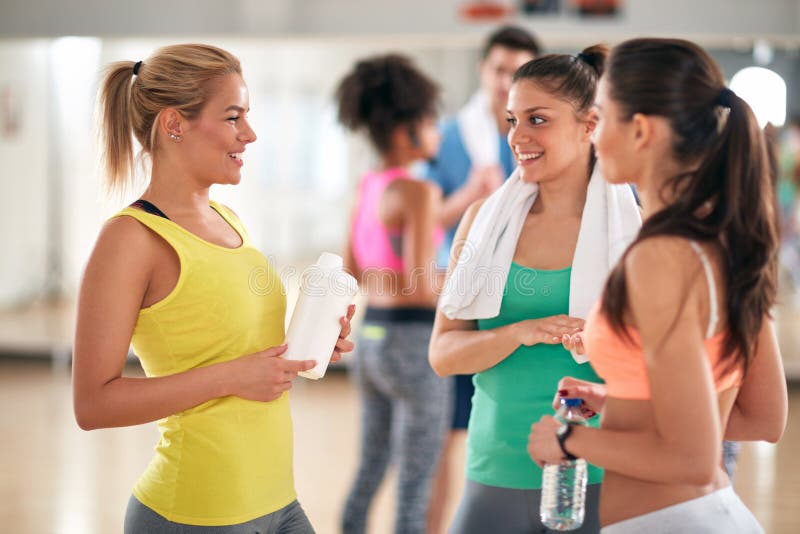 Women Talking and Refreshing on Break in Fitness Class Stock Image ...