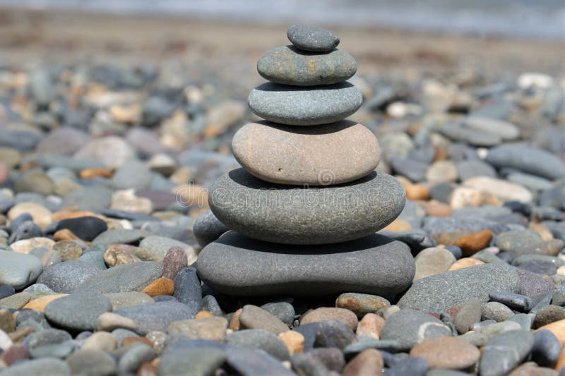 Three Zen Towers on a Rocky Beach. Stock Image - Image of sunny ...