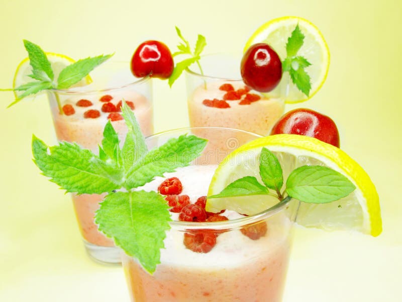 Threen Fruit Cocktails with Lemon and Cherry Stock Photo - Image of ...