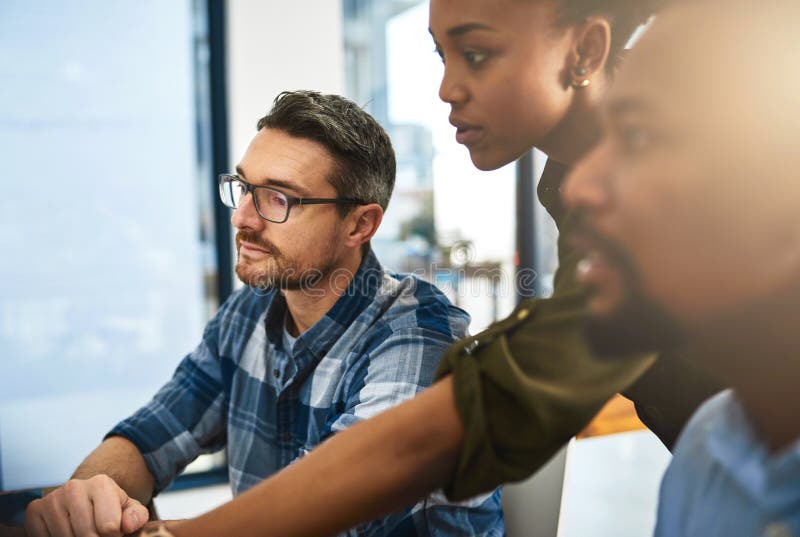 Threes Company. Three Businesspeople Working Together in the Office ...