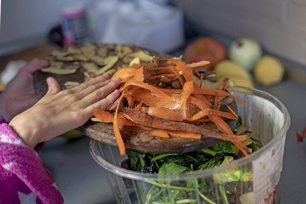 Throw Carrot and Potato Skins into the Trash. Stock Photo - Image of ...