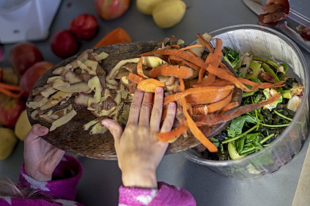 Throw Carrot and Potato Skins into the Trash. Stock Image - Image of ...