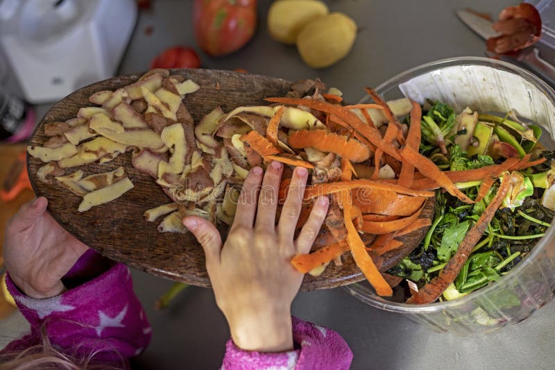 Throw Carrot and Potato Skins into the Trash. Stock Photo - Image of ...