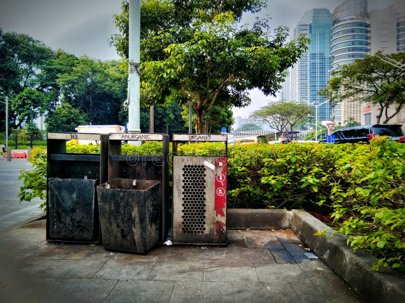 Throw garbage in its place stock image. Image of garbage - 250670443