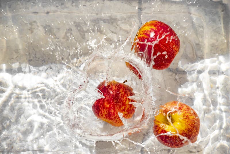 Throwing Apples Red into the Water Stock Photo - Image of natural ...