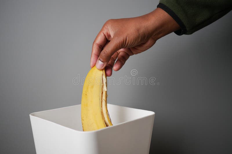Throwing Banana in a Garbage Bin Stock Image - Image of rubbish, waste ...
