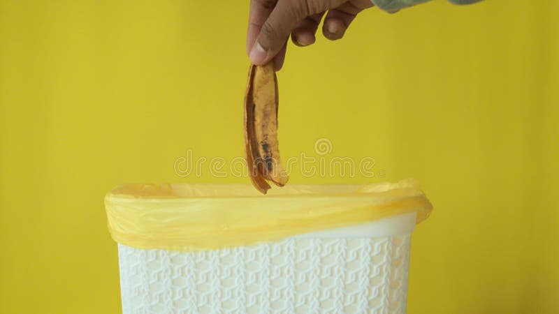 Throwing Banana in a Garbage Bin Stock Footage - Video of environment ...