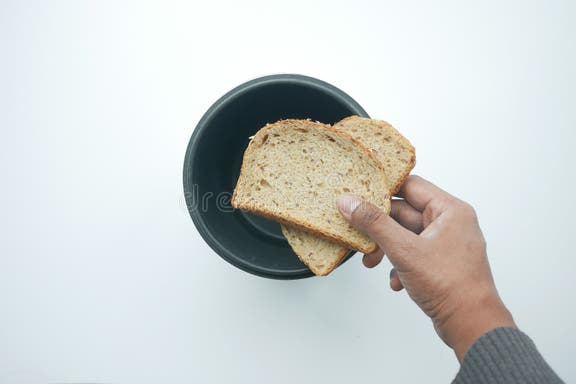 Throwing Bread in a Garbage Bin Stock Photo - Image of recycling, loaf ...
