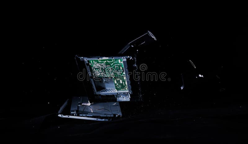 Throwing and Breaking a Screen into Pieces Isolated on a Black Backdrop ...