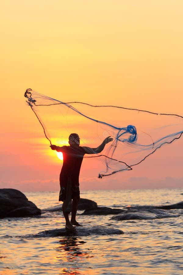 Throwing Fishing Net during Sunrise Stock Photo - Image of moment, lake ...