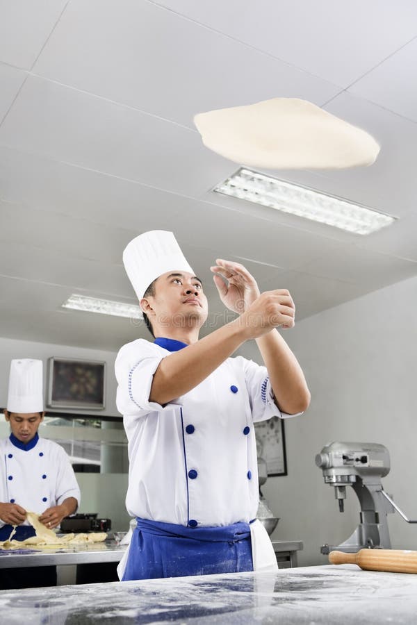 Throwing pizza dough stock image. Image of tray, south - 14049267